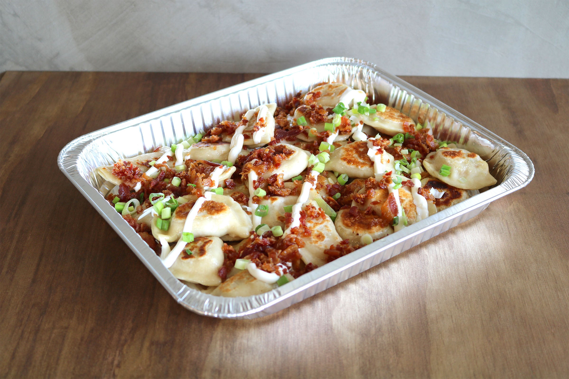 Loaded pierogi platter with twenty eight grilled pierogies | Pierogi House